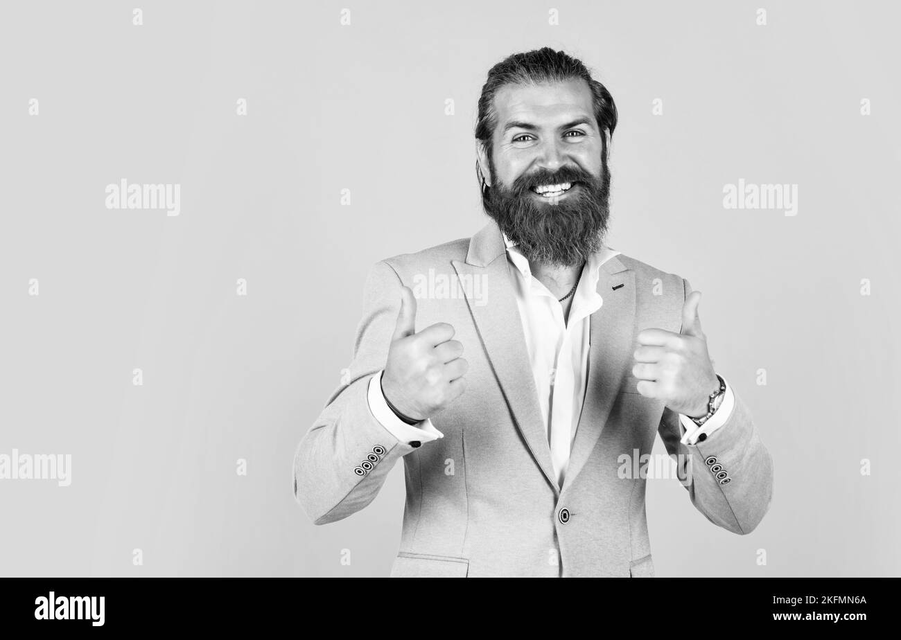 thumb up gesture. elegant businessman wear elegant apparel for formal ...