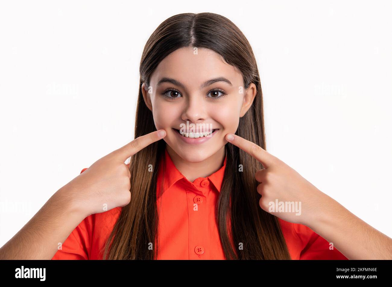tooth of teen girl in tshirt. teen girl point finger on tooth. teen ...