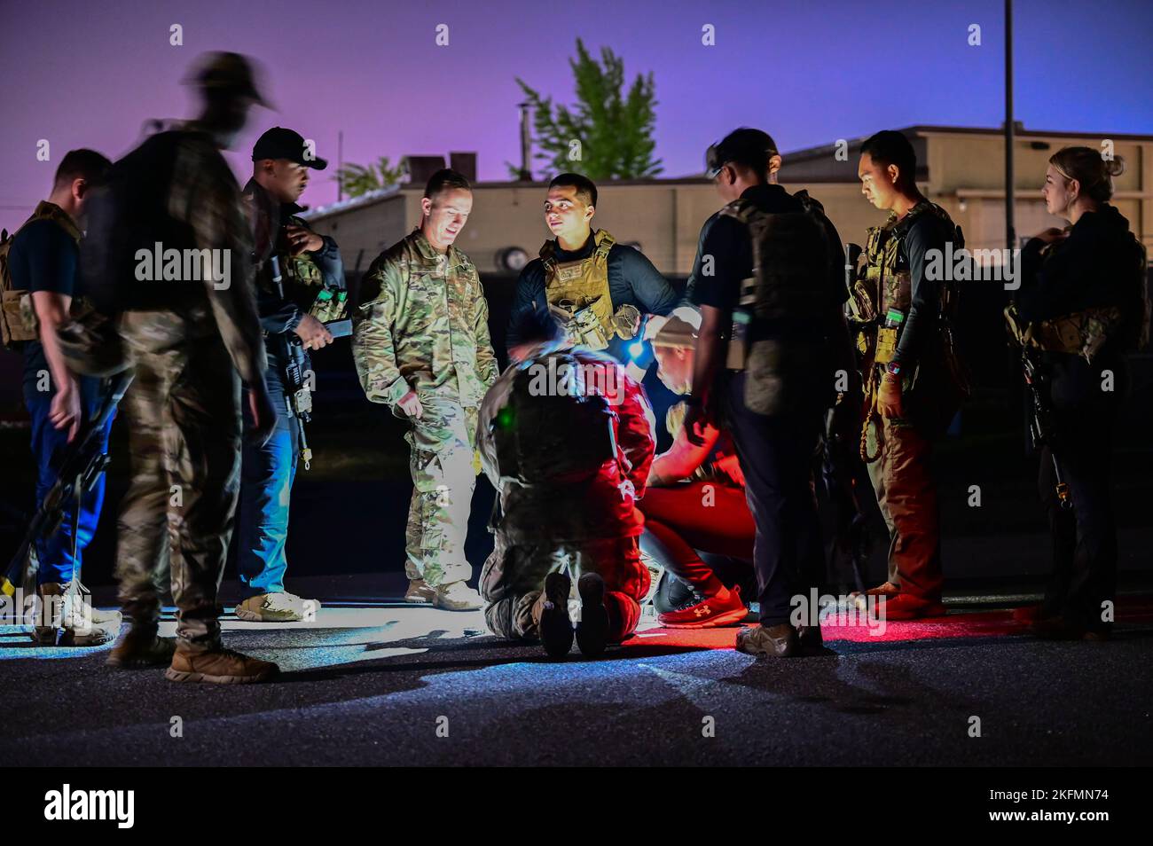 Airmen from the 8th Security Forces Squadron strategize during a ...