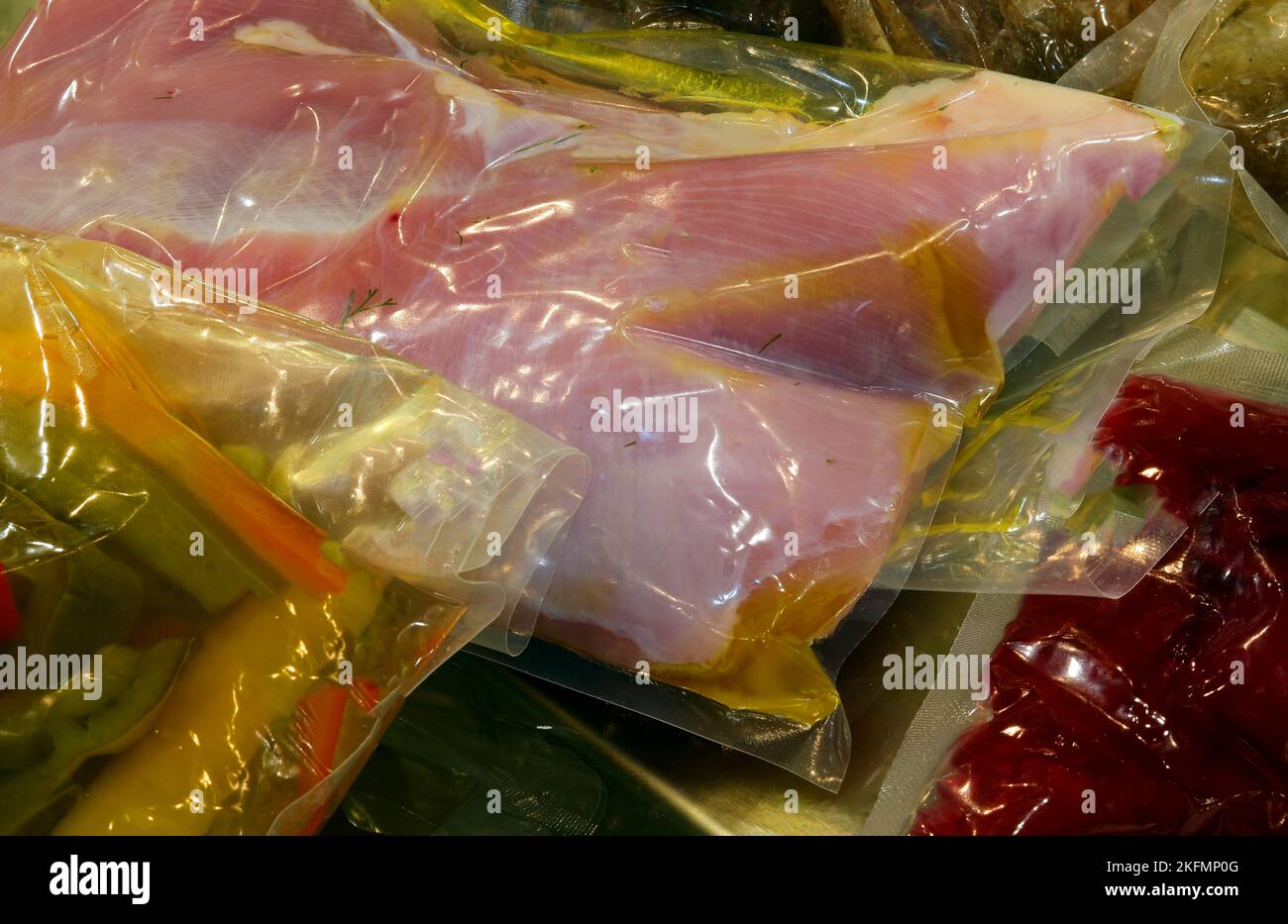 vacuum-packed food in plastic bags with the long-term and low ...