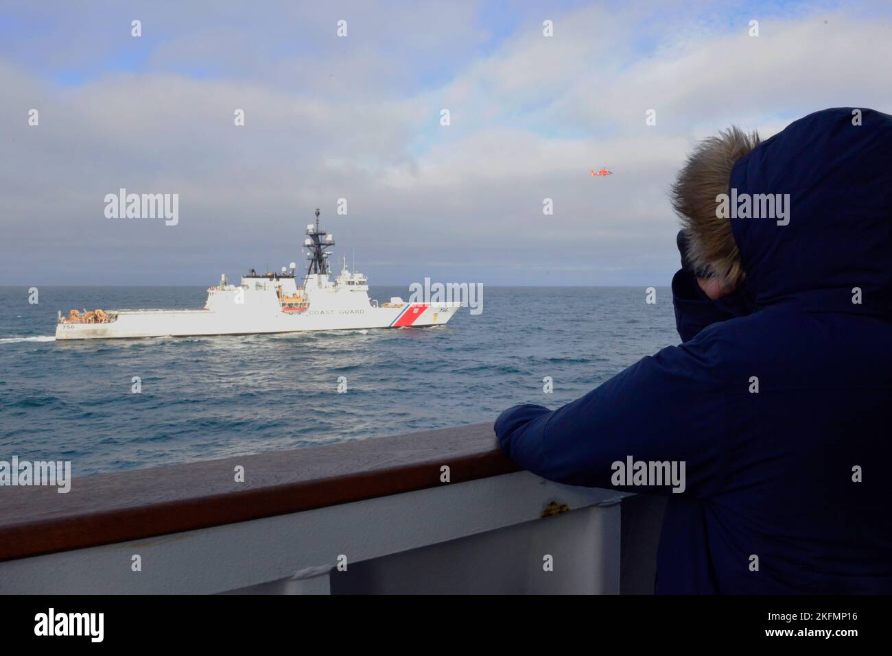 A crewmember aboard USCGC Stratton (WMSL 752) monitors distance to ...