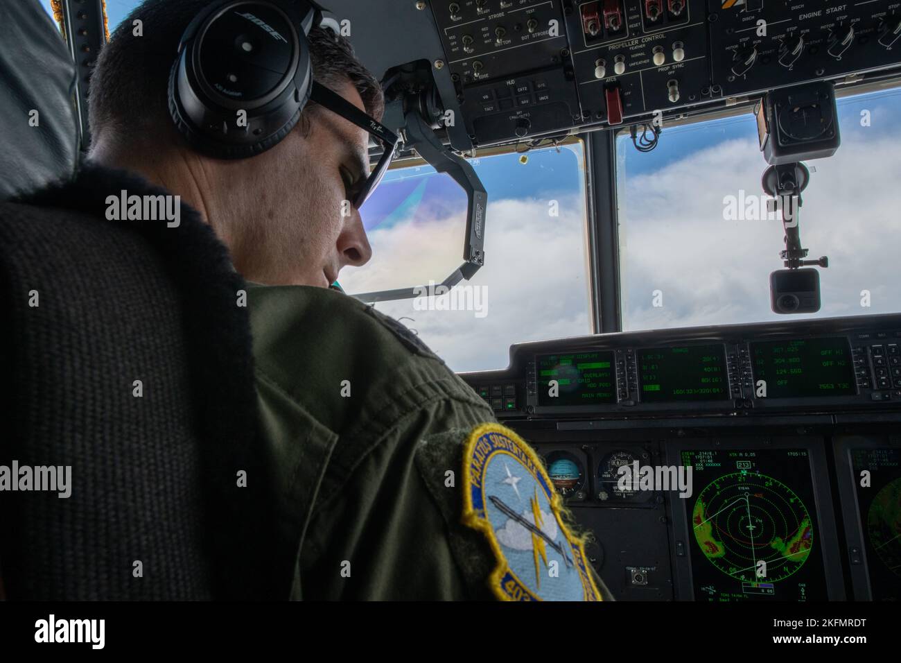 Lt. Col. Dave Gentile, WC-130J aircraft commander, flies a 53rd Weather ...