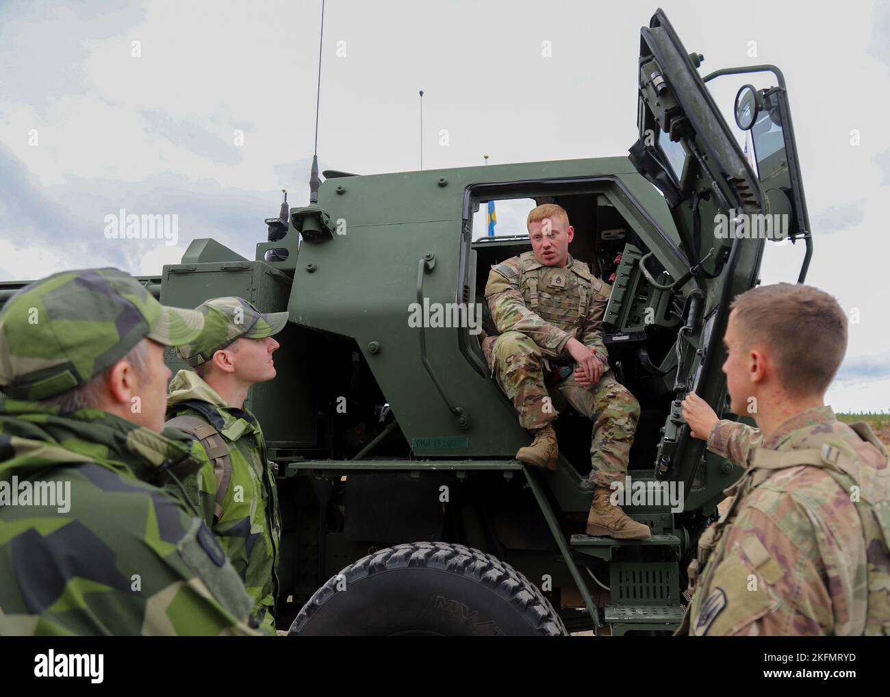 U.S. Army Staff Sgt. Cody Prine, a section chief, and Pfc. William ...
