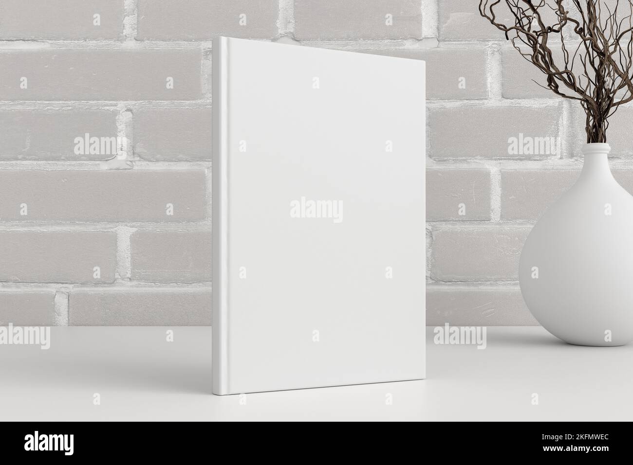 Vertical book cover mock up standing on a white desk with white brick ...