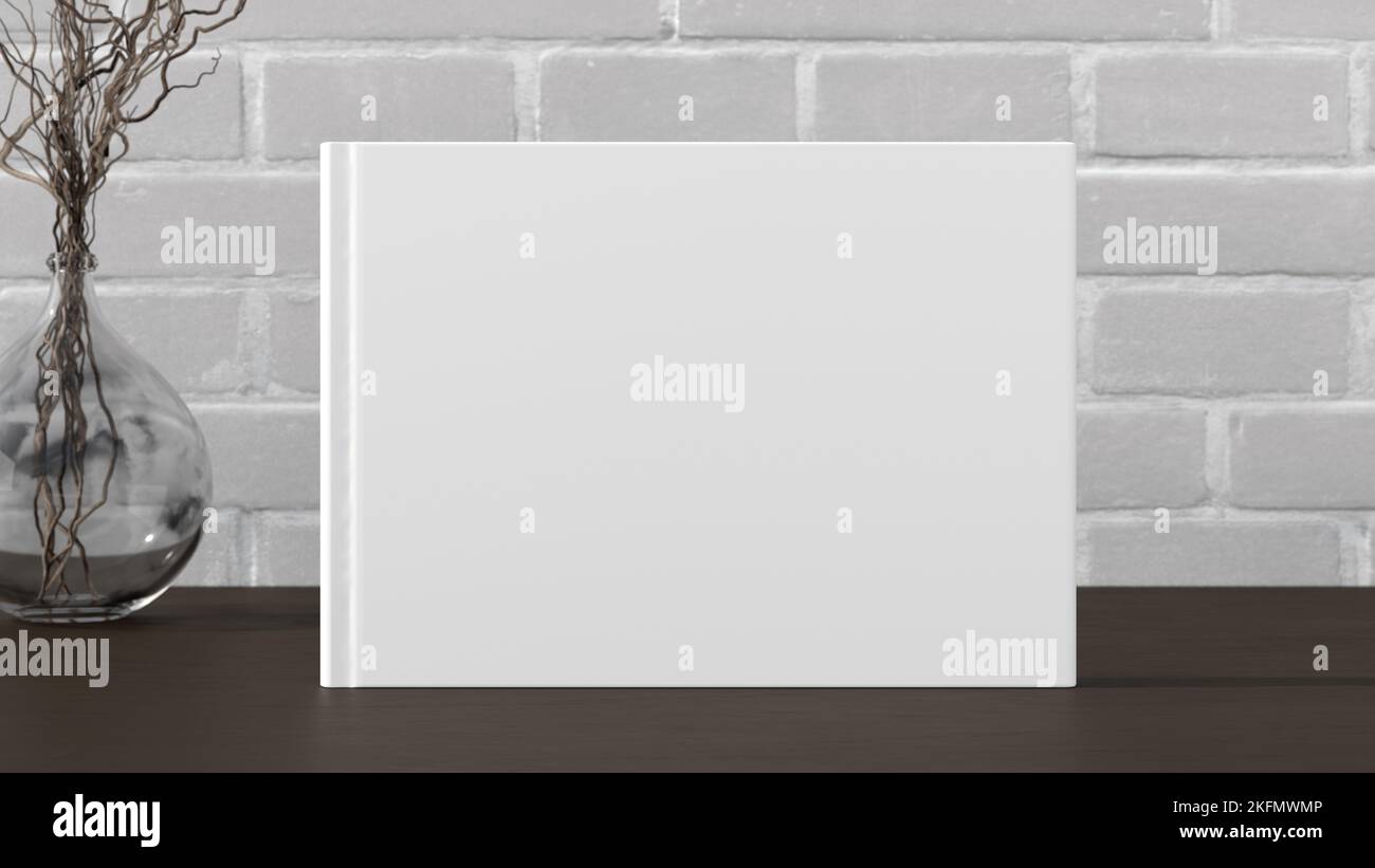 Horizontal book cover mock up standing on a dark wooden desk with white ...