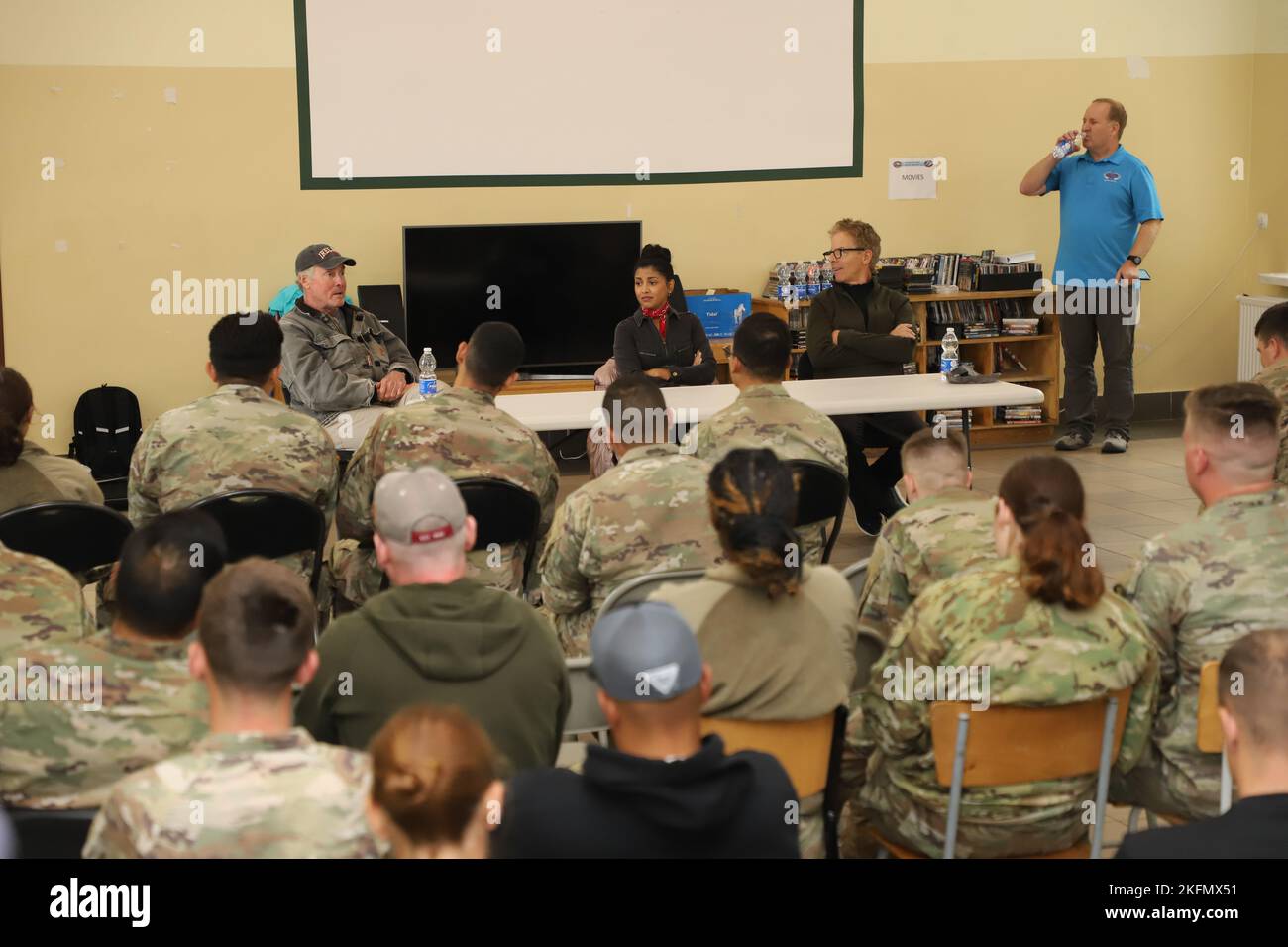 Soldiers in Powidz, Poland ask questions of the actors during the ...