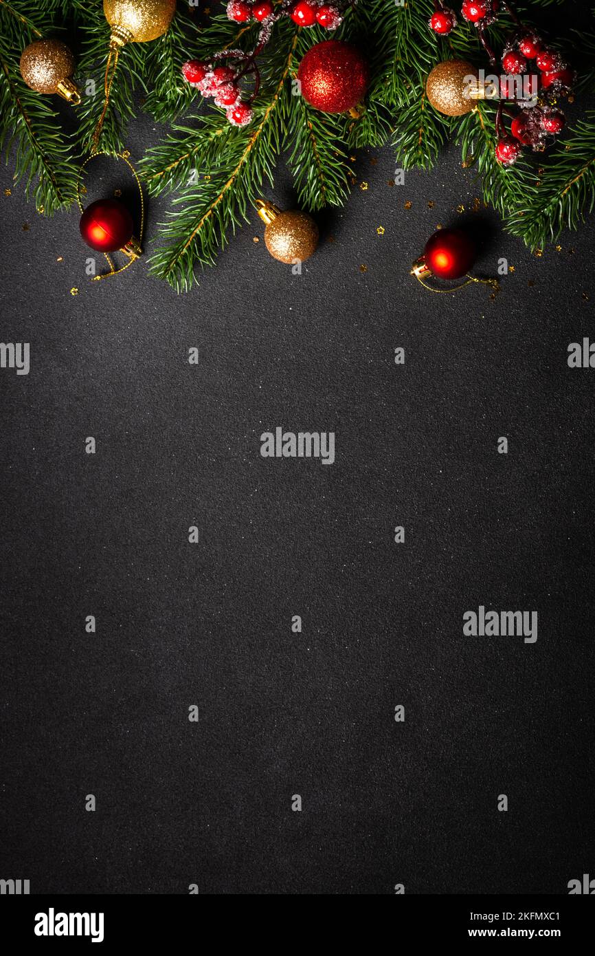 Christmas flat lay background with holiday decorations on black Stock ...