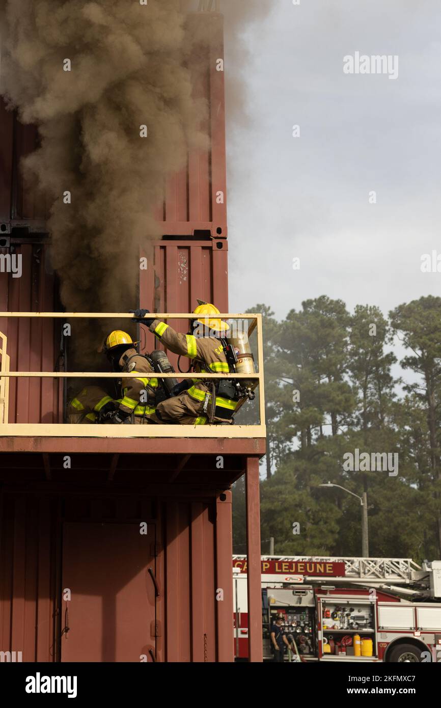 Firefighters with Camp Lejeune Fire and Emergency Services Division ...