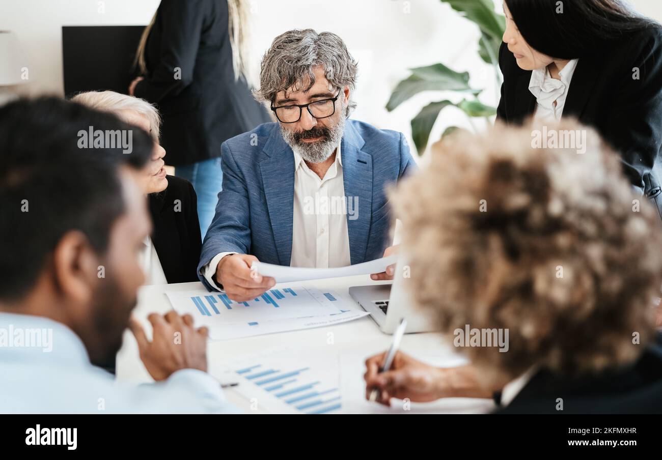 Multiracial business team working together in a modern office ...