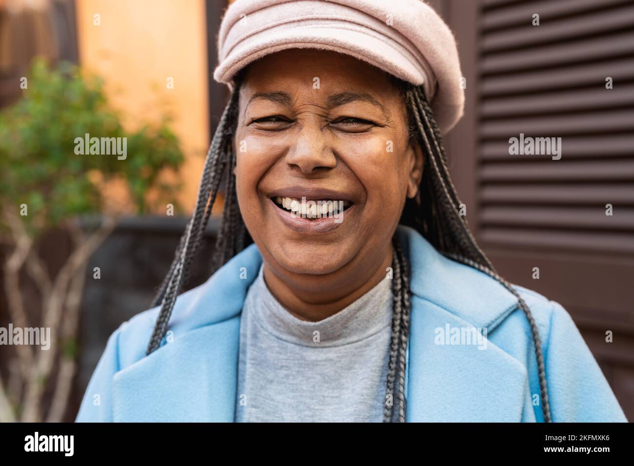 Happy Senior African Woman Having Fun Looking In Front Of A Camera In