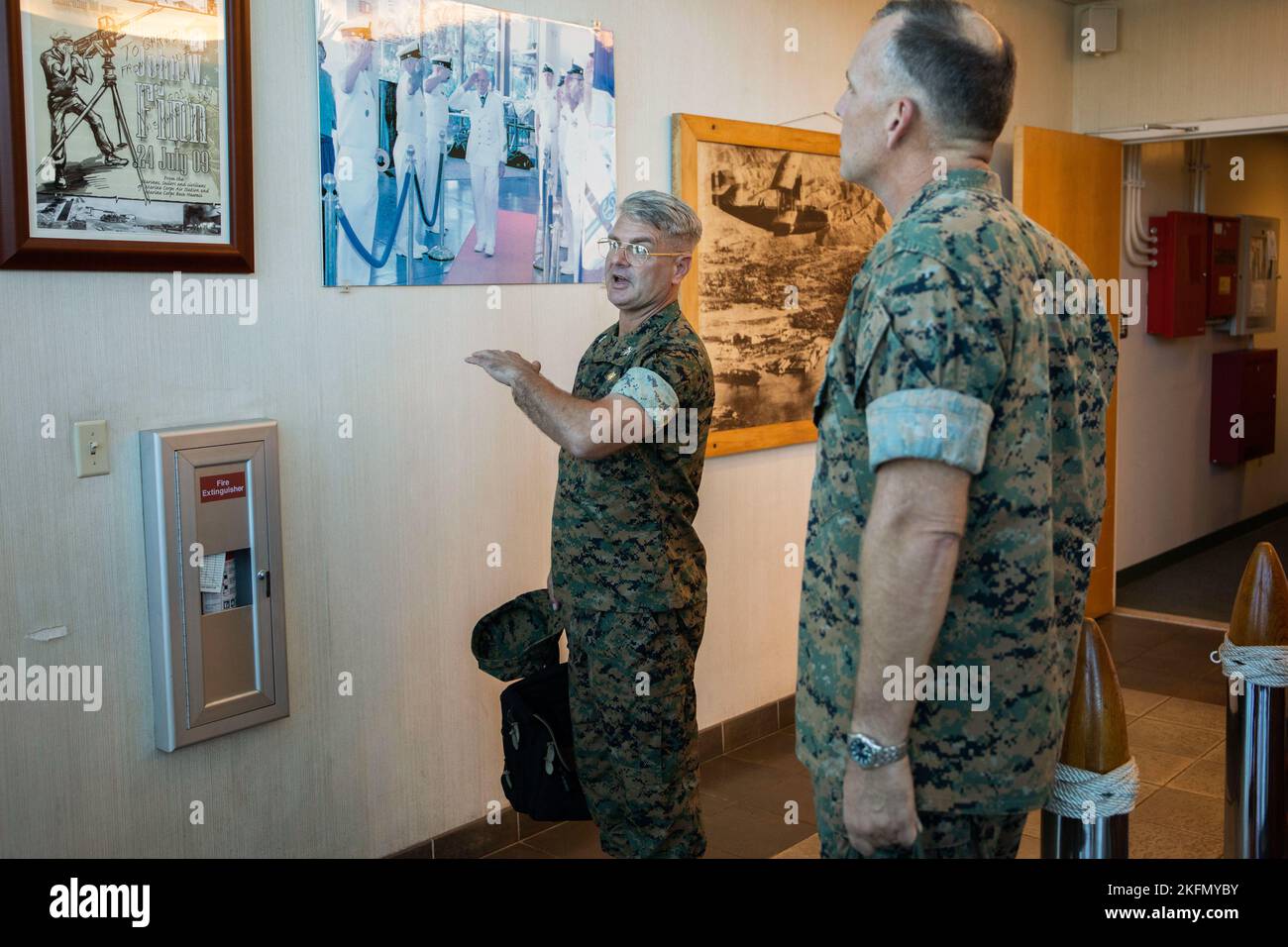 U.S. Marine Corps Col. Manlee Herrington, center, commanding officer ...