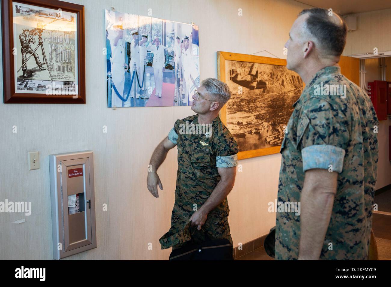 U.S. Marine Corps Col. Manlee Herrington, center, commanding officer ...
