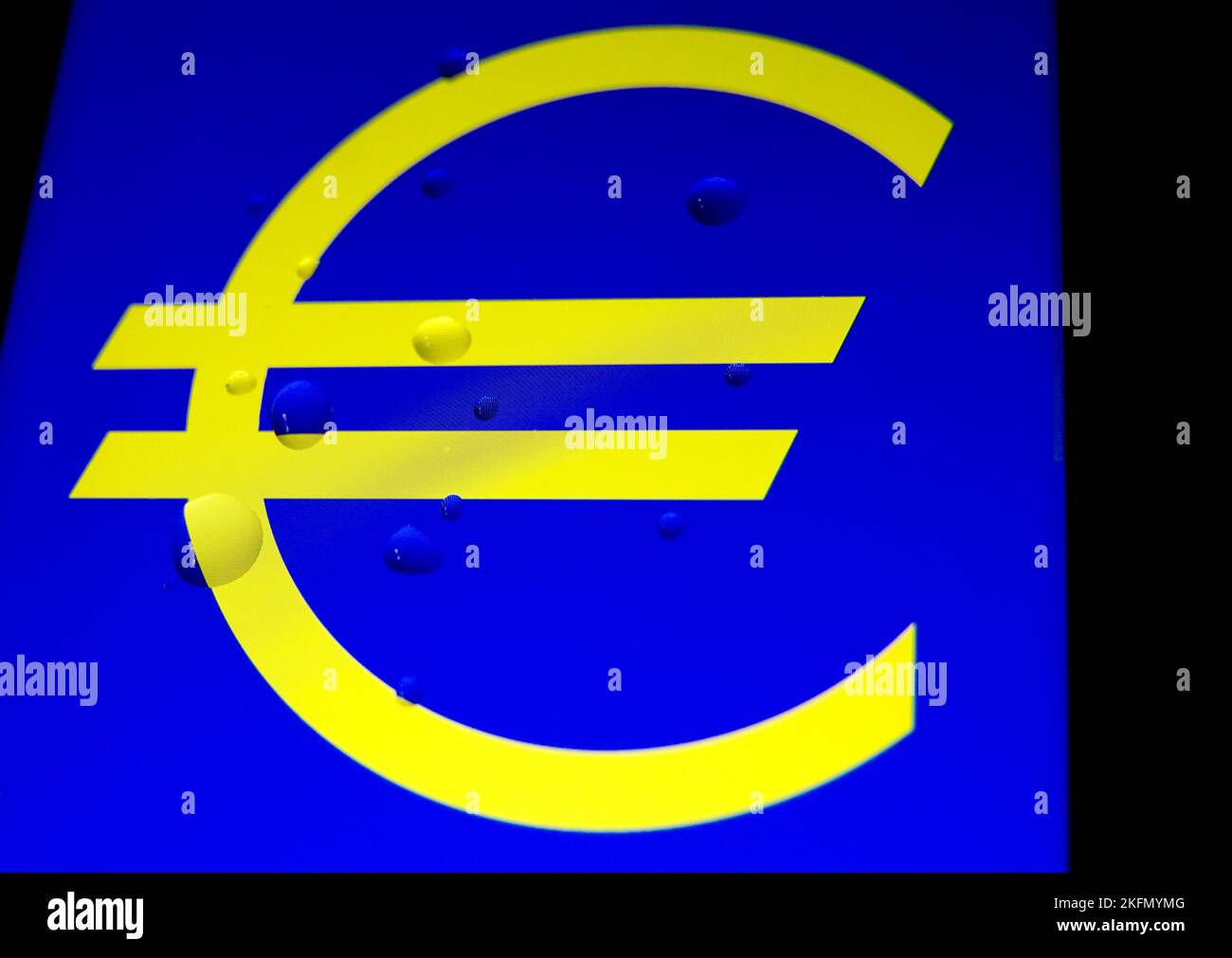 logo of a euro on smartphone display with waterdrops Stock Photo - Alamy