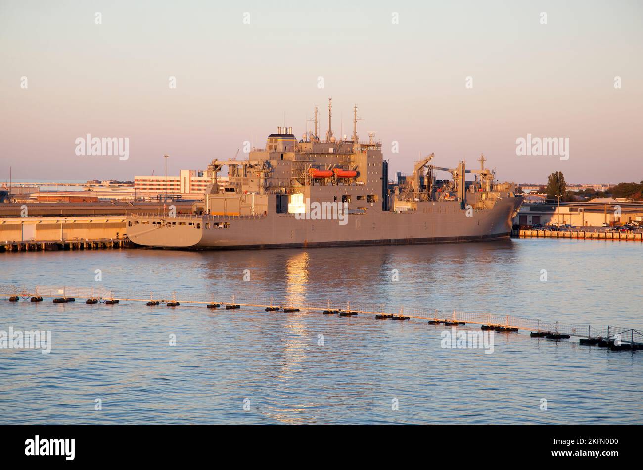 The view of a navy ship moored in a military base outside Norfolk in a ...