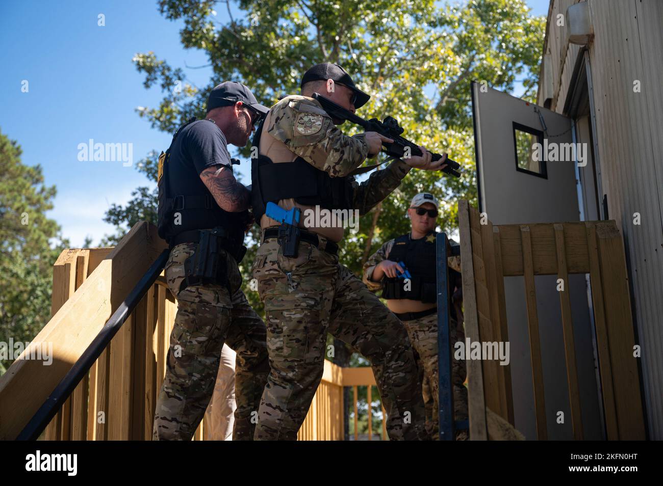 U.S. Police Officers assigned to the Special Weapons and Tactics (SWAT ...