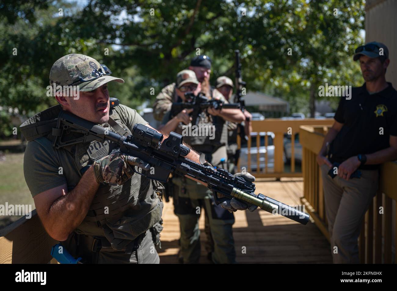 U.S. Police Officers assigned to the Special Weapons and Tactics (SWAT ...