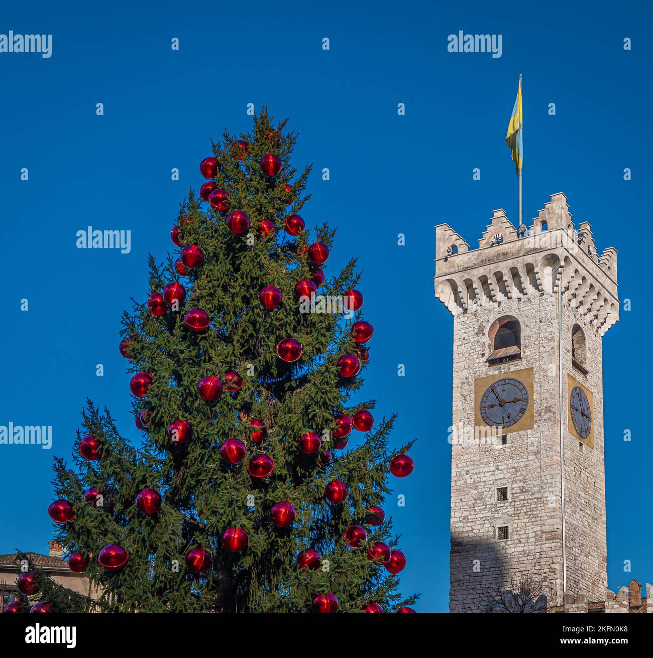 Trento Christmas, Cathedral bell tower in piazza del Duomo in Trento ...