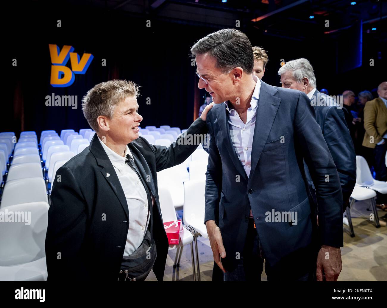 ROTTERDAM - Mark Rutte (VVD) talks to a party member during the autumn ...