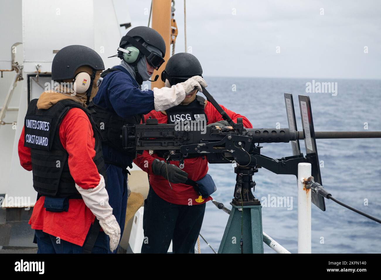 U.S. Coast Guard Petty Officer 3rd Class Ian Eckelberg, a gunner’s mate ...