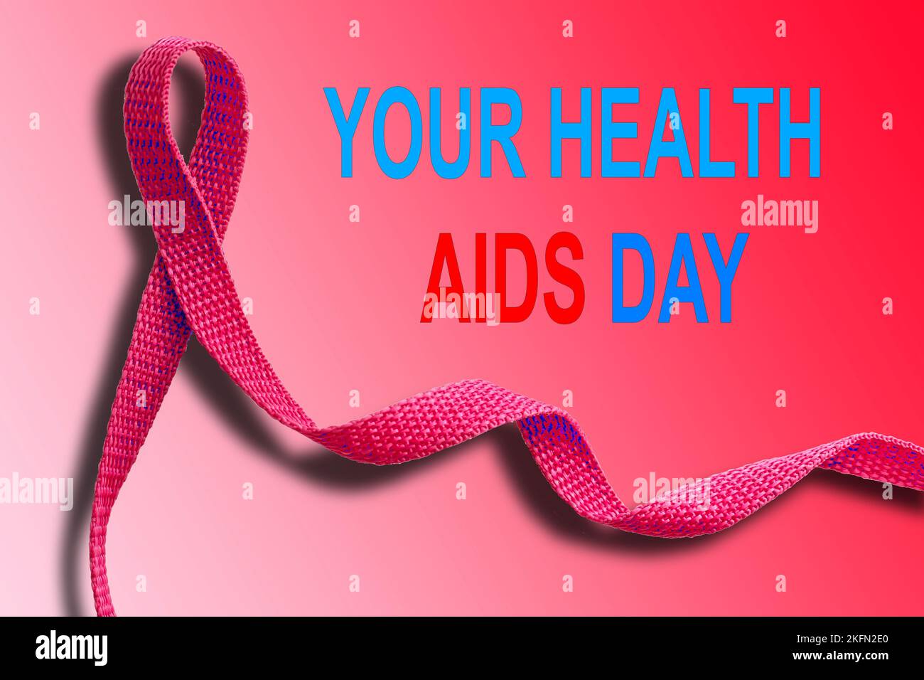red ribbon. AIDS awareness sign. World HIV Day symbol Stock Photo - Alamy