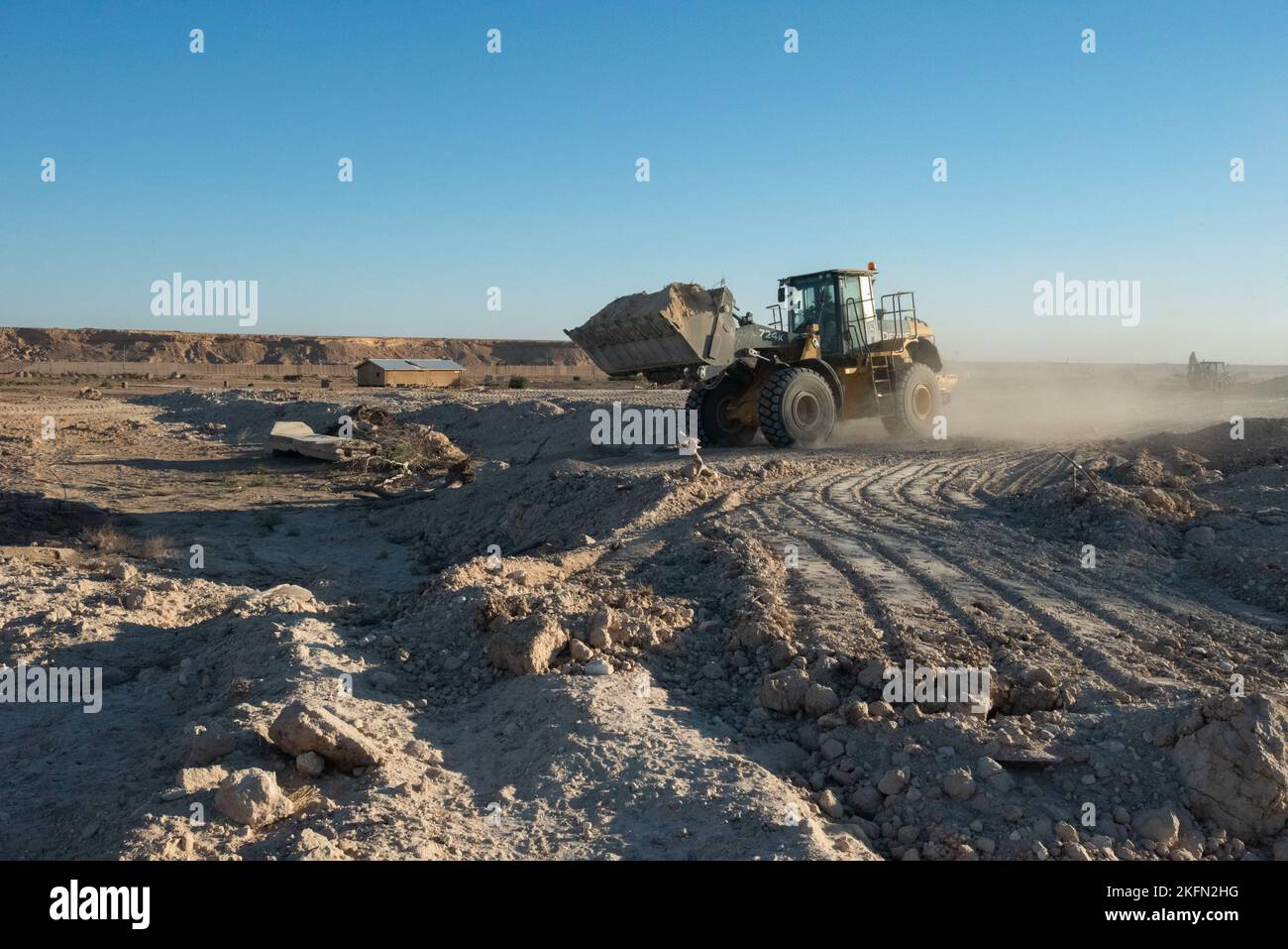 A John Deere 724K front loader operated by a Polish engineer, with Task ...