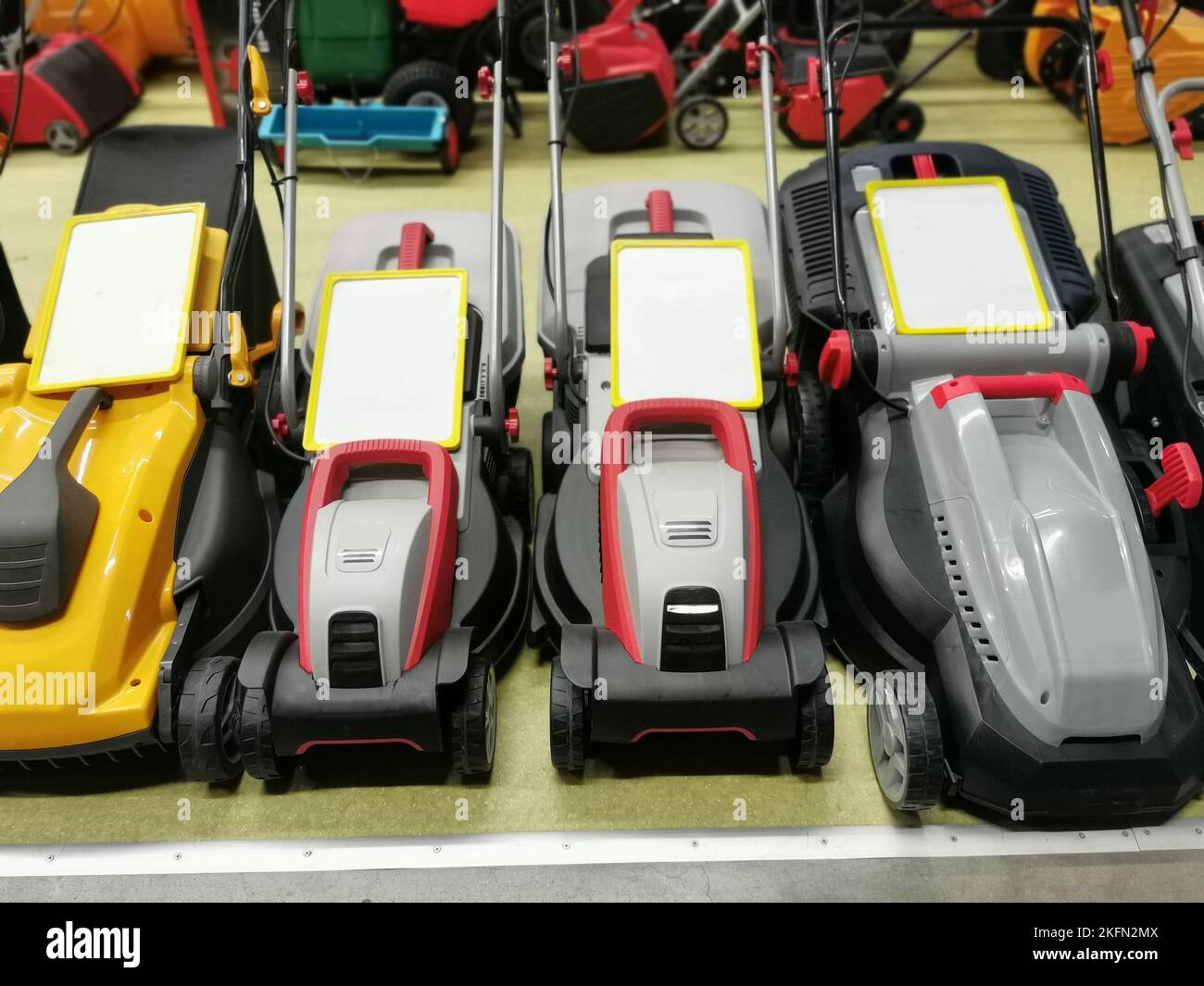 Lawn mowers are sold in the shop. Garden equipment in stock in the ...