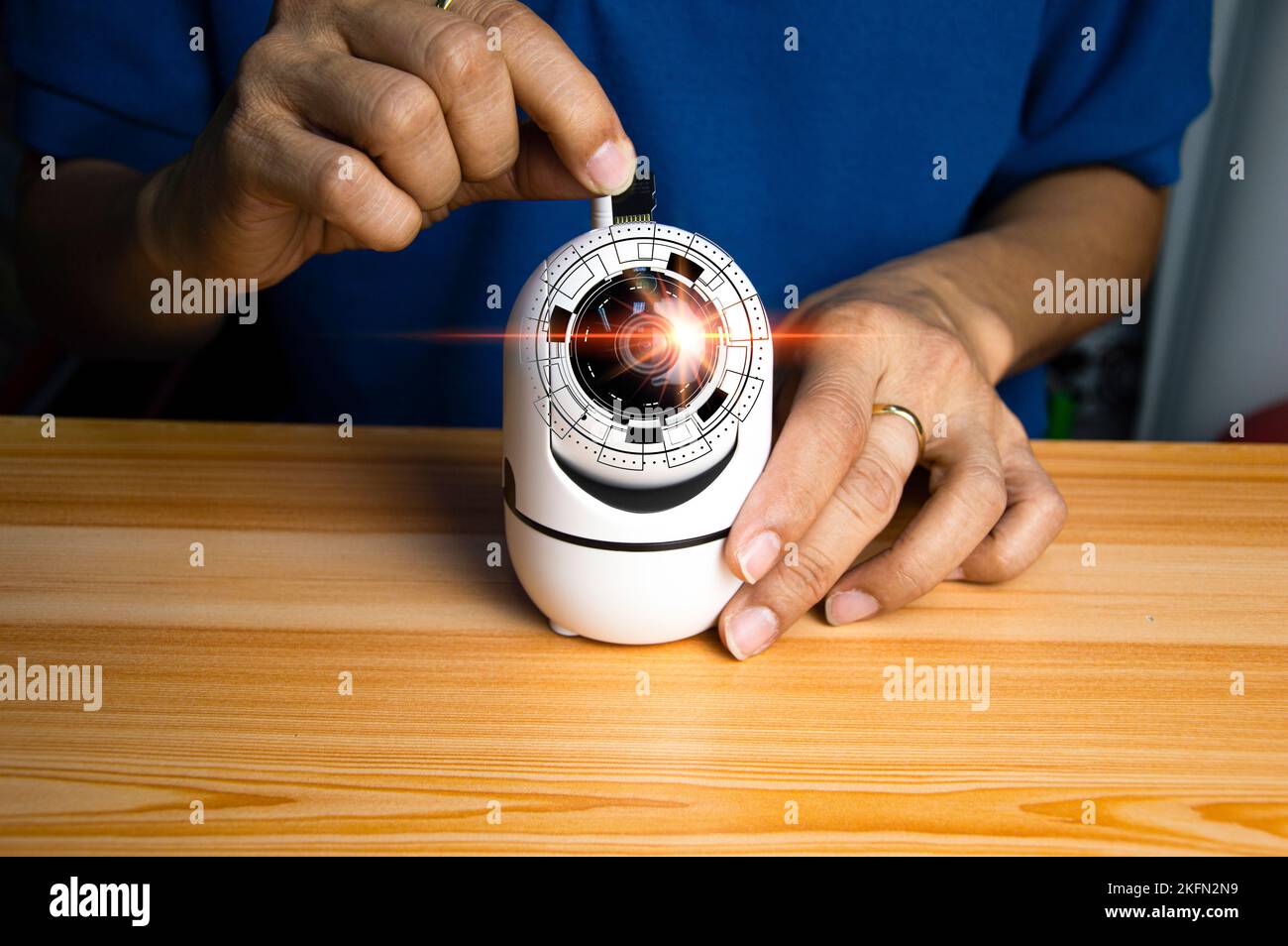 Conceptual man operating ip camera Stock Photo - Alamy