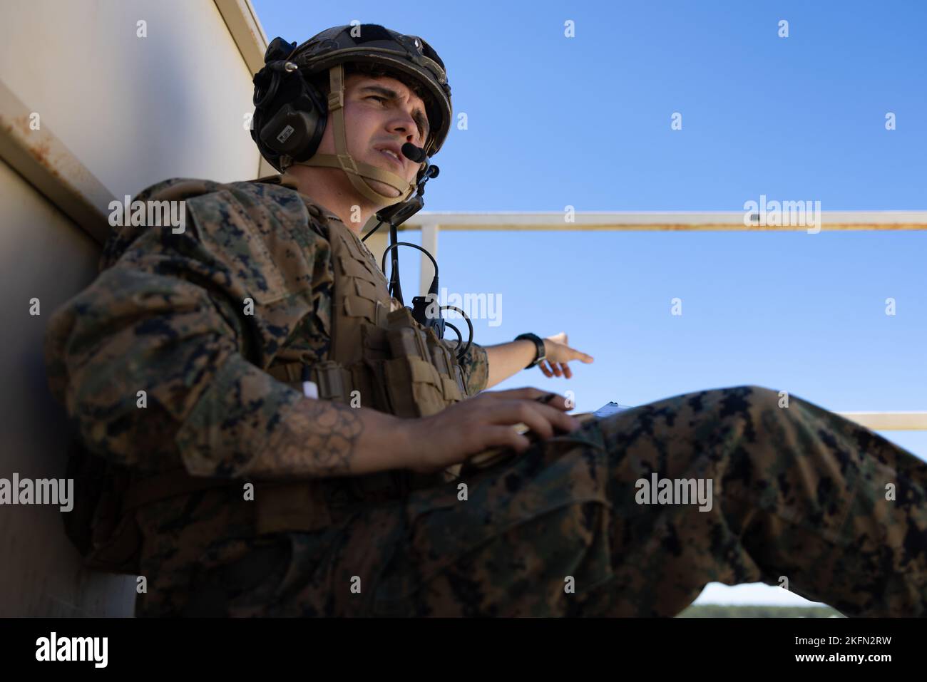 U.S. Marine Corps Sgt. Lucas Cook, a field radio operator with 4th Air ...