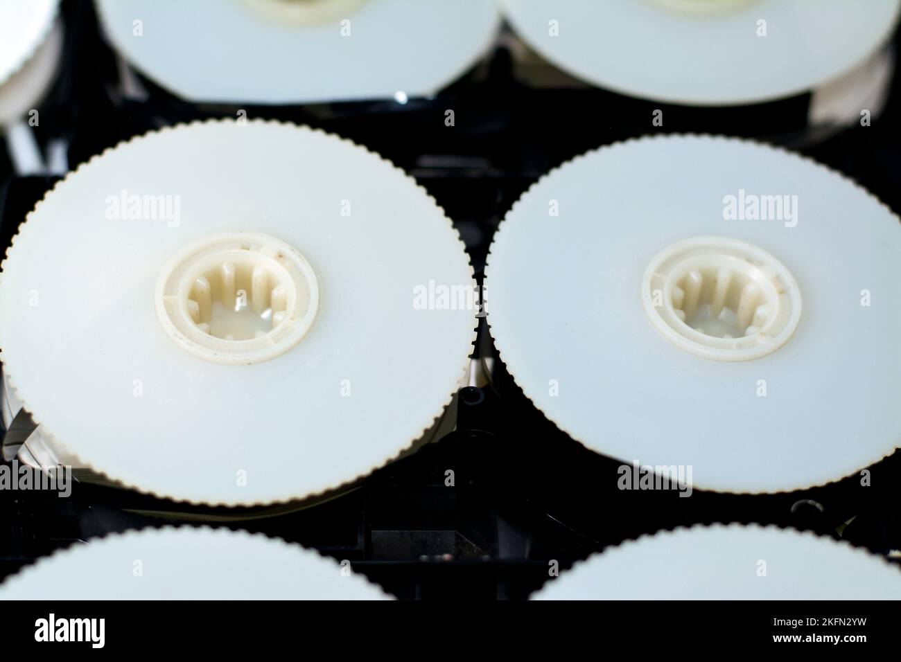 Pile of VHS video cassette tape from inside with the front casing ...