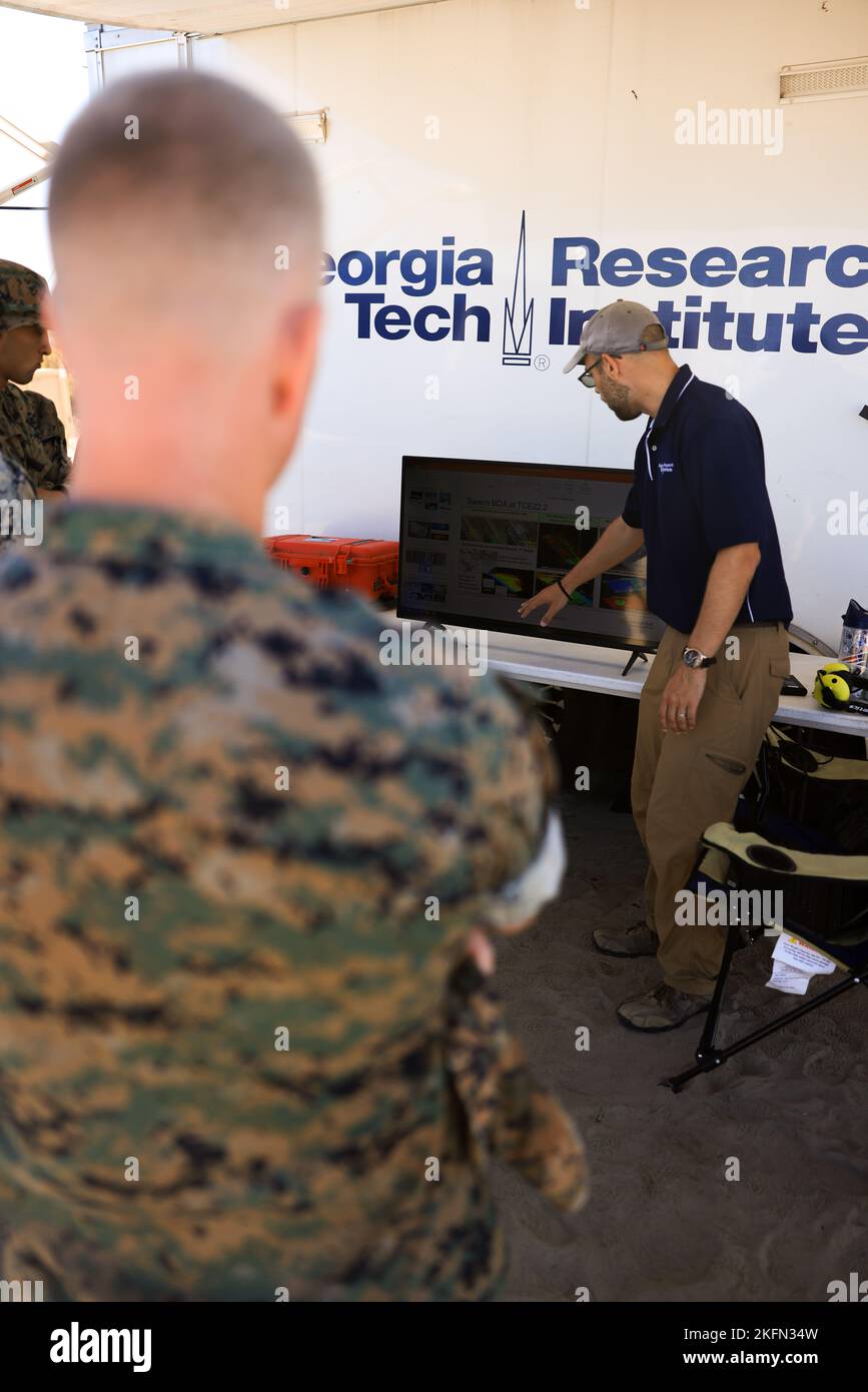A contractor explains the Swarm Battle Damage Assessment to U.S ...