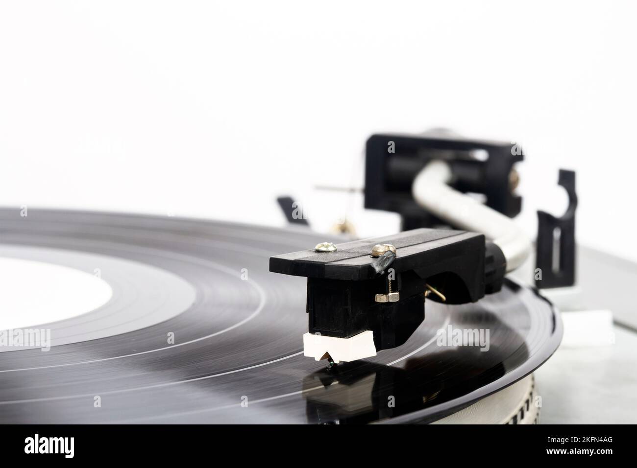 Close up of turntable needle on a vinyl record. Turntable playing vinyl ...