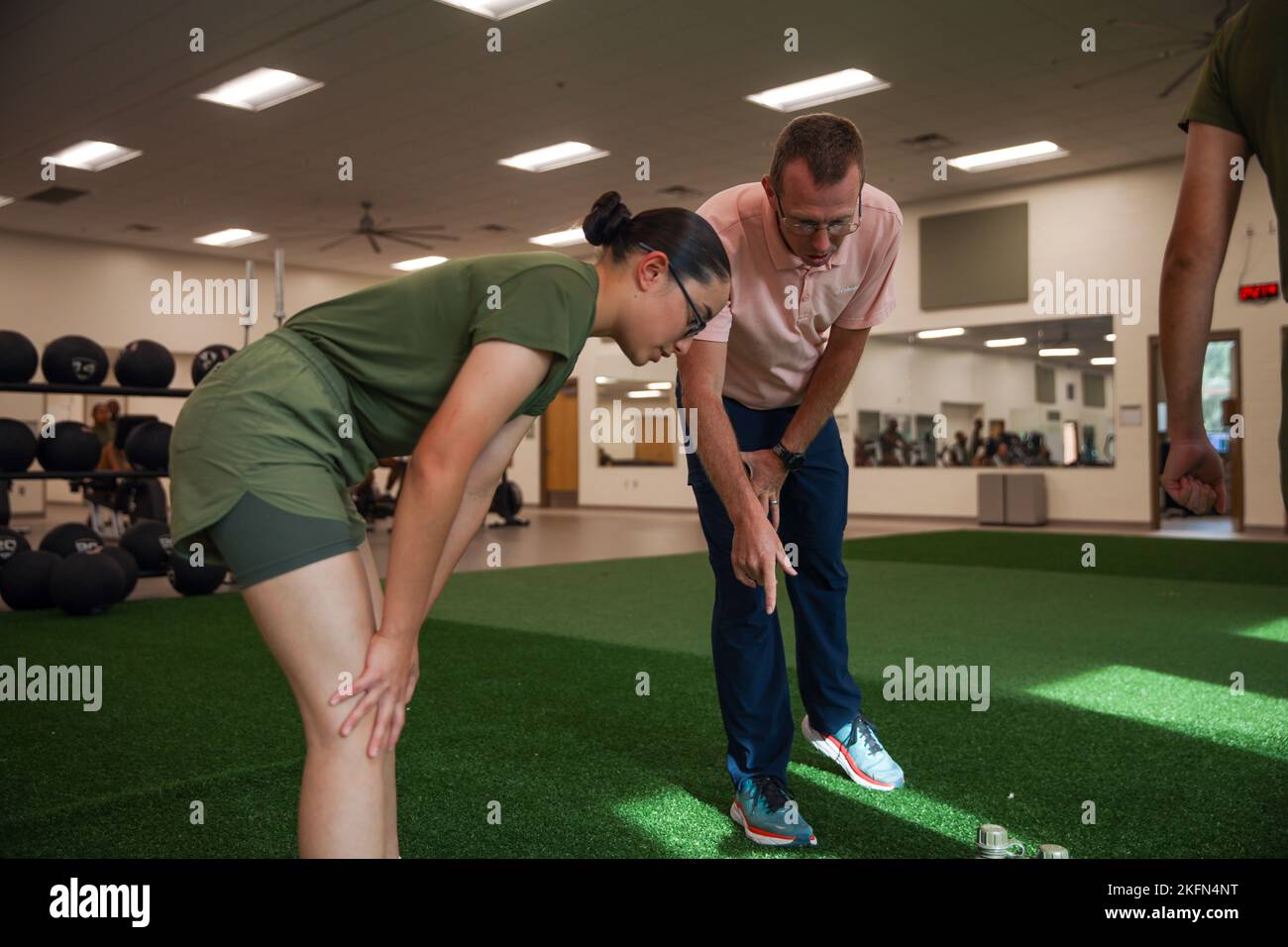 Sports Medicine Injury Prevention Trainer Jay Gibson assists recruits ...