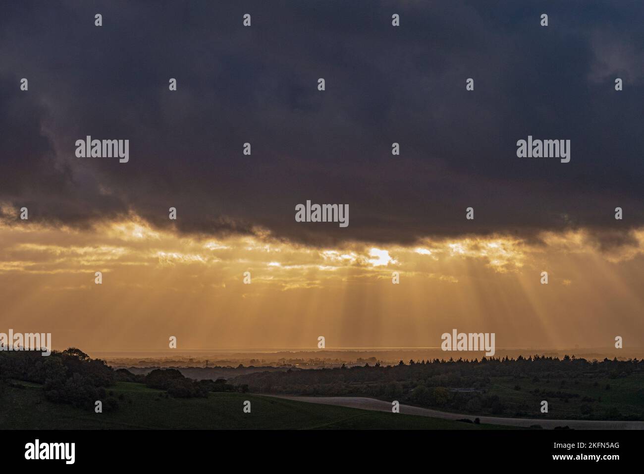 Dramatic sky as the sun sets over the south coast of Sussex and ...