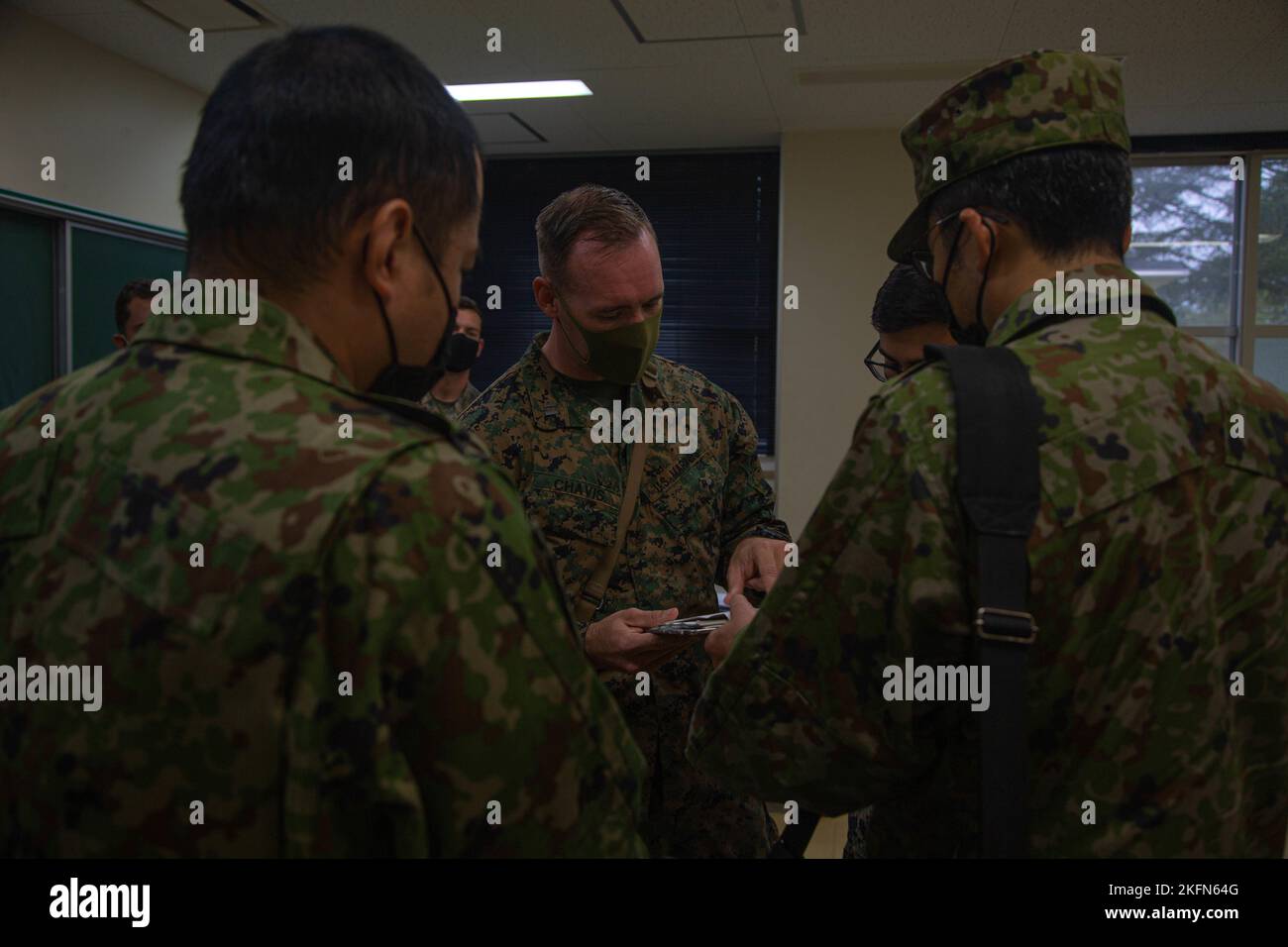 U.S. Marines with 12th Marine Regiment, 3d Marine Division and members ...