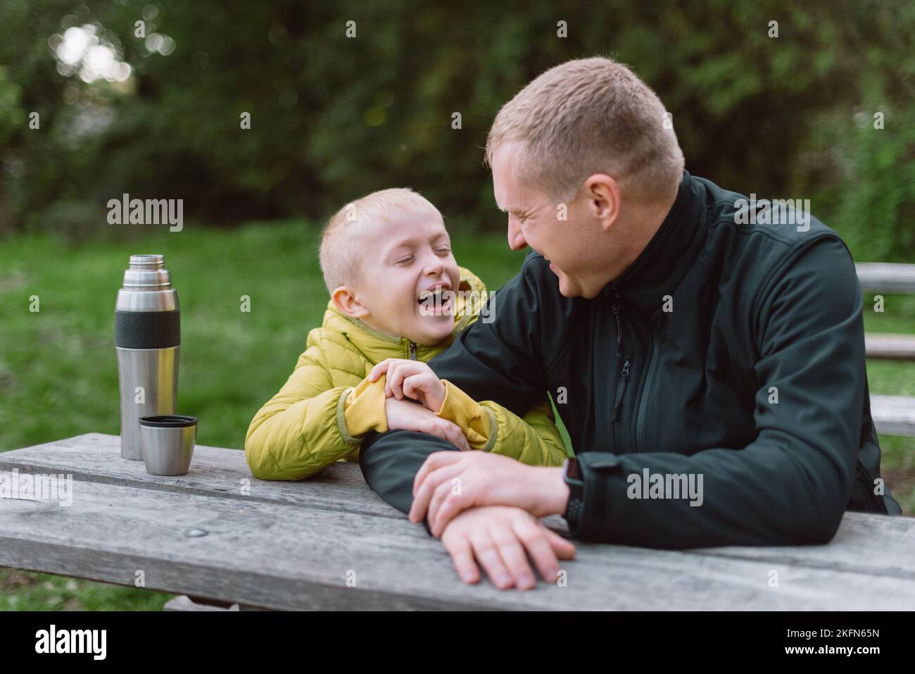 Happy family: father and child boy son playing and laughing in autumn ...