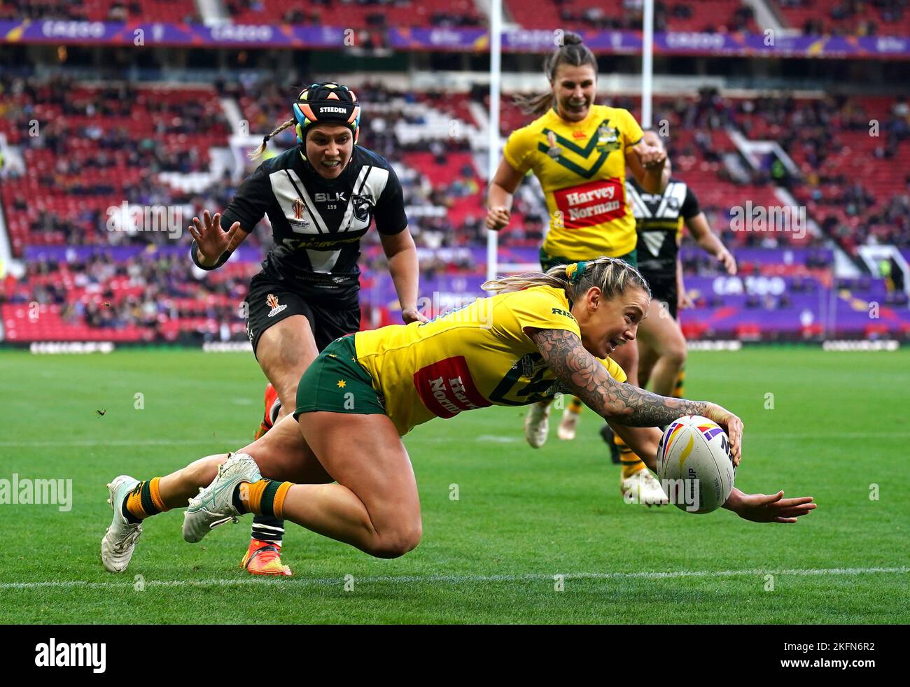 Australia's Julia Robinson scores their side's third try of the game ...
