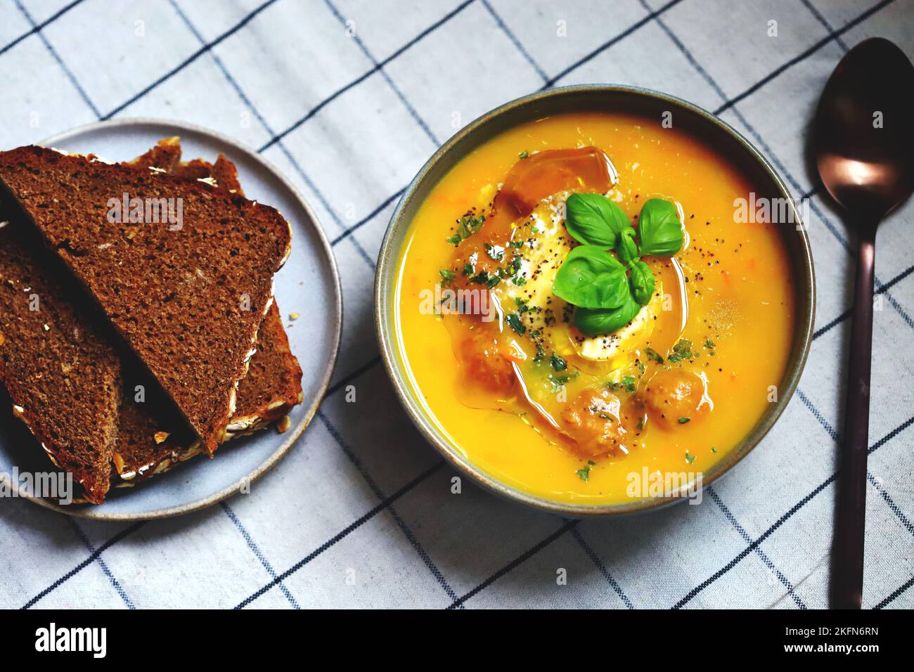 Pumpkin carrot soup with meatballs in a bowl. Autumn menu Stock Photo ...