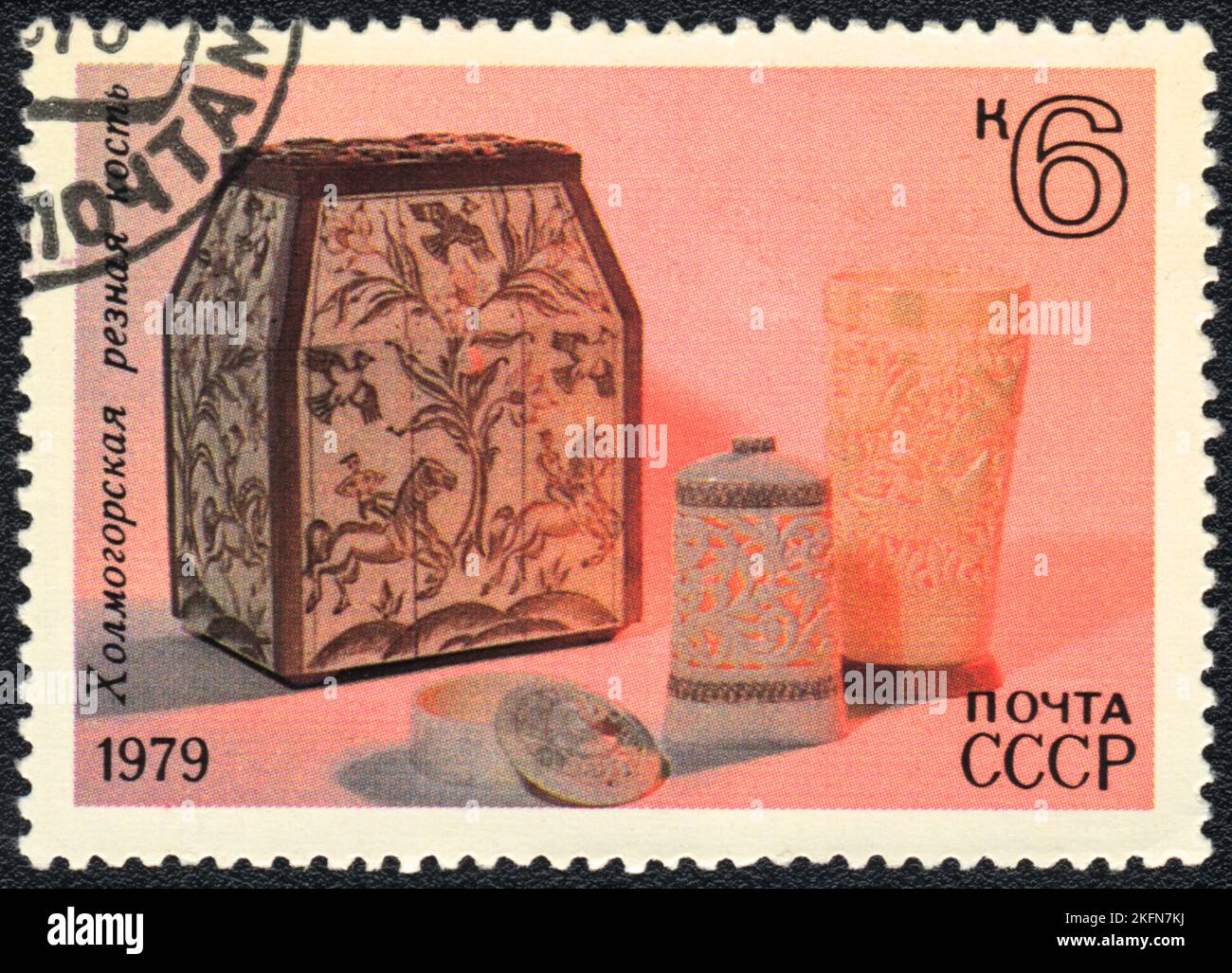 A stamp printed in USSR shows Holmogorskaya carved bone Russian folk ...