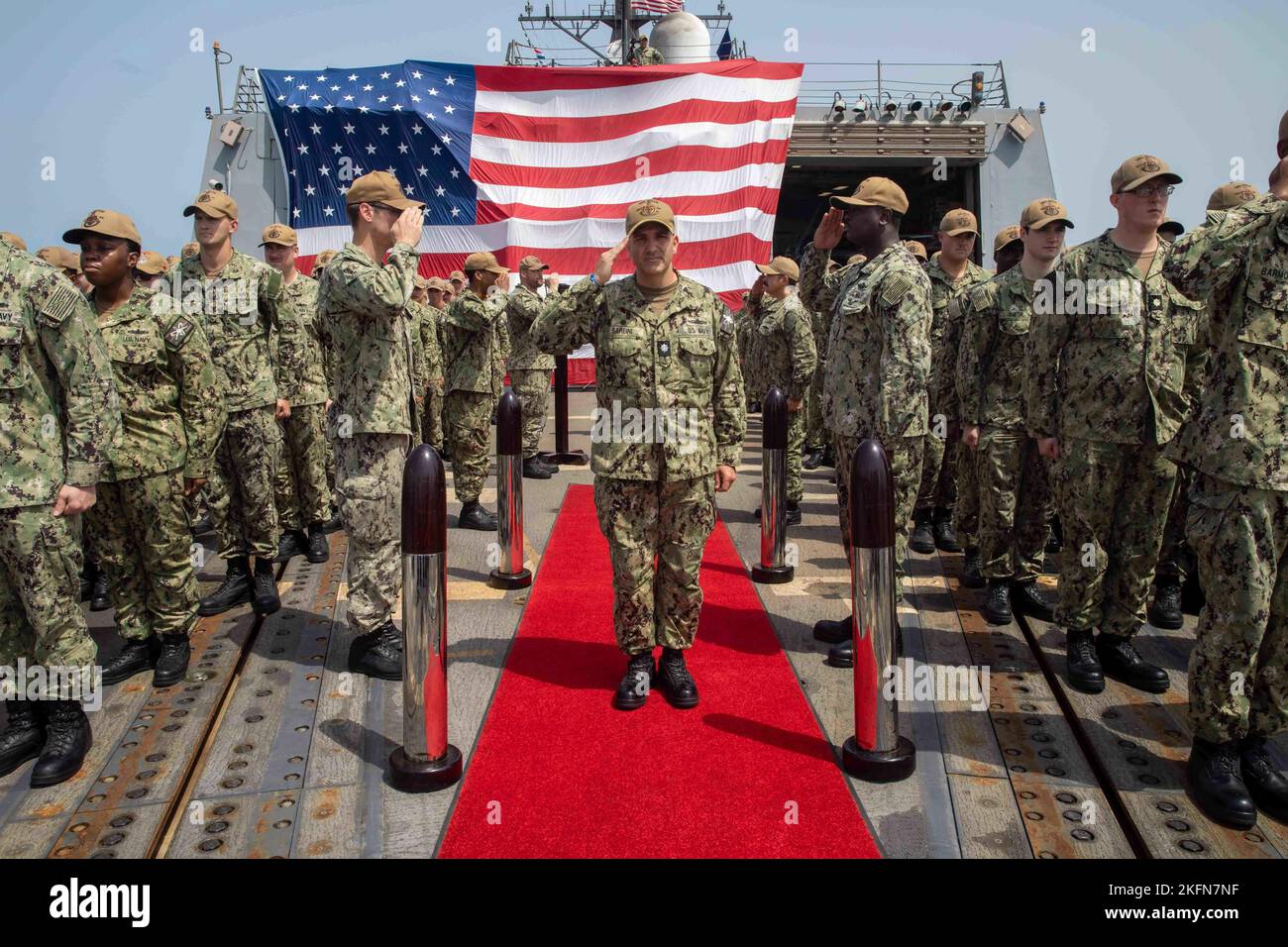 220928-N-EH998-1020 GULF OF ADEN (Sept. 28, 2022) Sideboys salute Cmdr ...