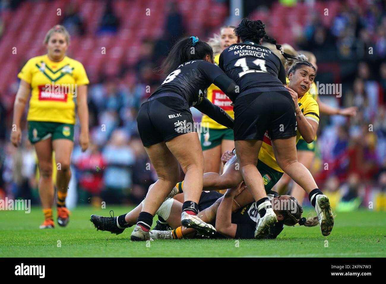 Australia's Shannon Mato (right) is tackled by New Zealand's Roxy ...