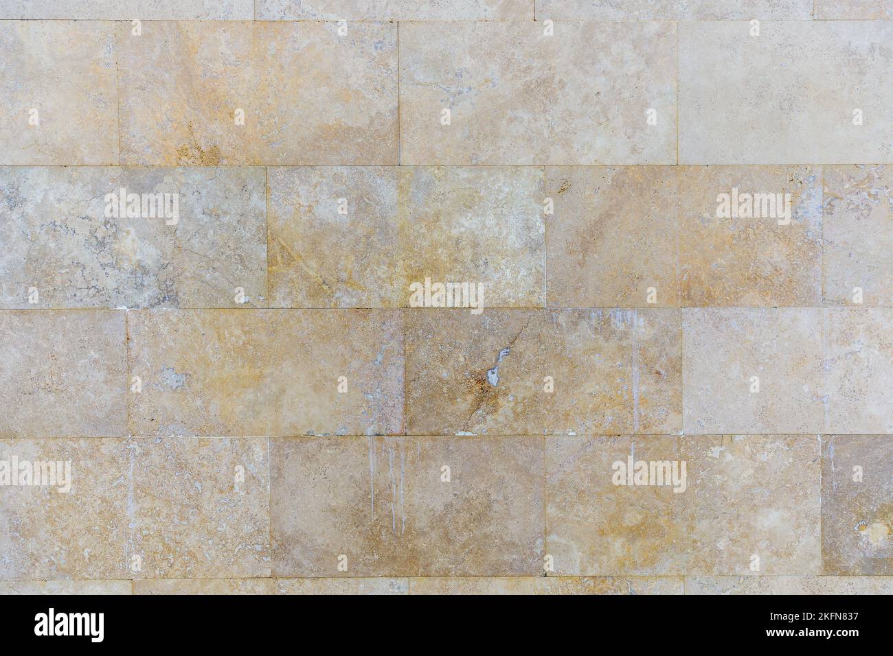 The texture of the wall lined with marble tiles Stock Photo - Alamy