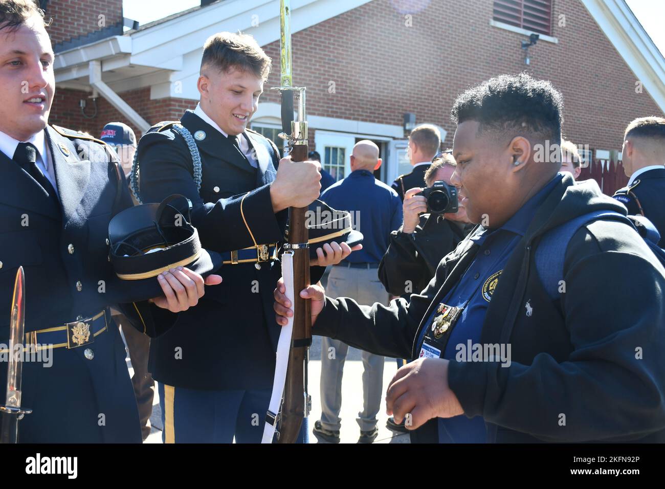 Burn survivors mingle with members of the 3d U.S. Infantry Regiment's ...