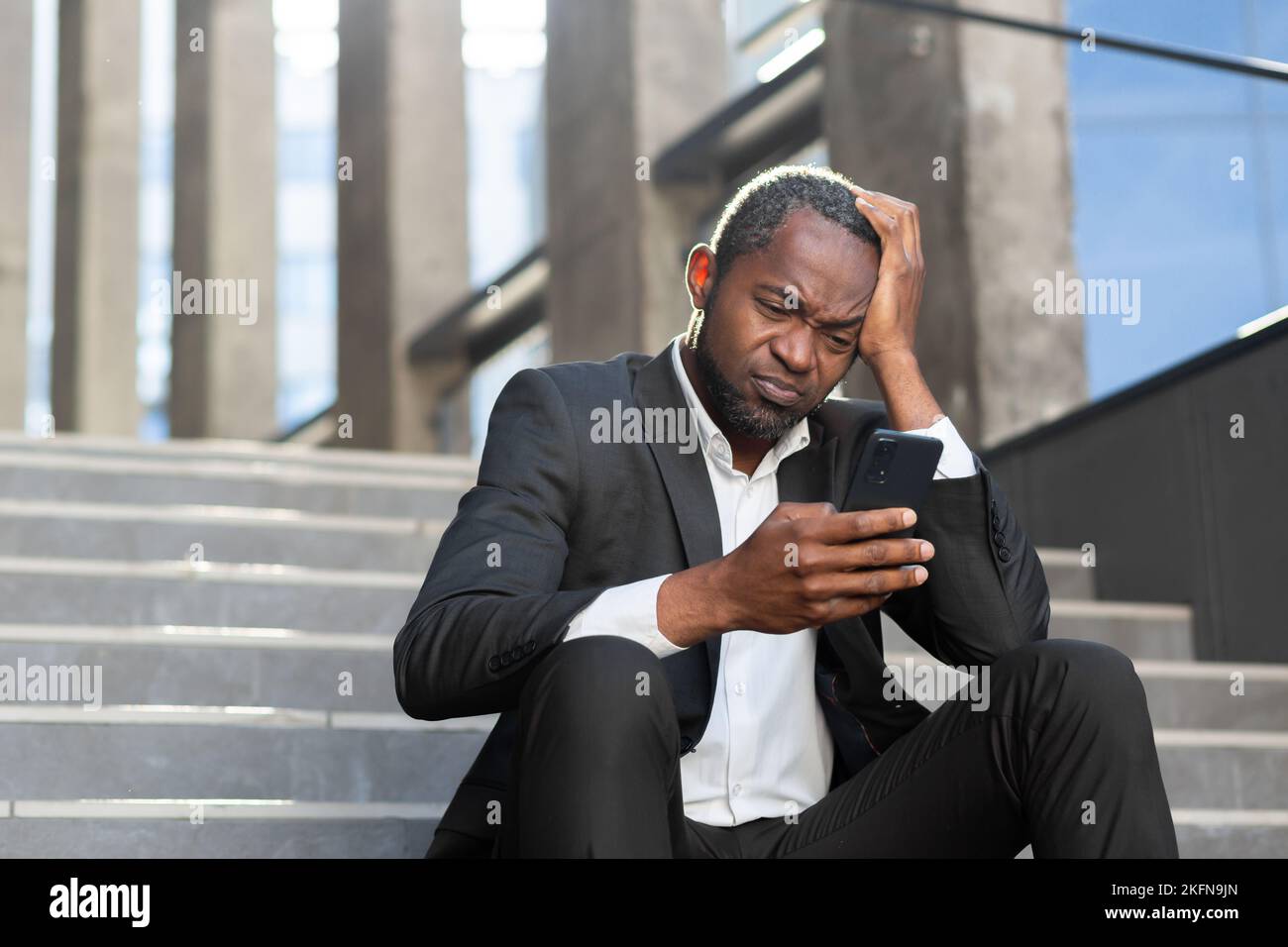 African male sad office hi-res stock photography and images - Alamy