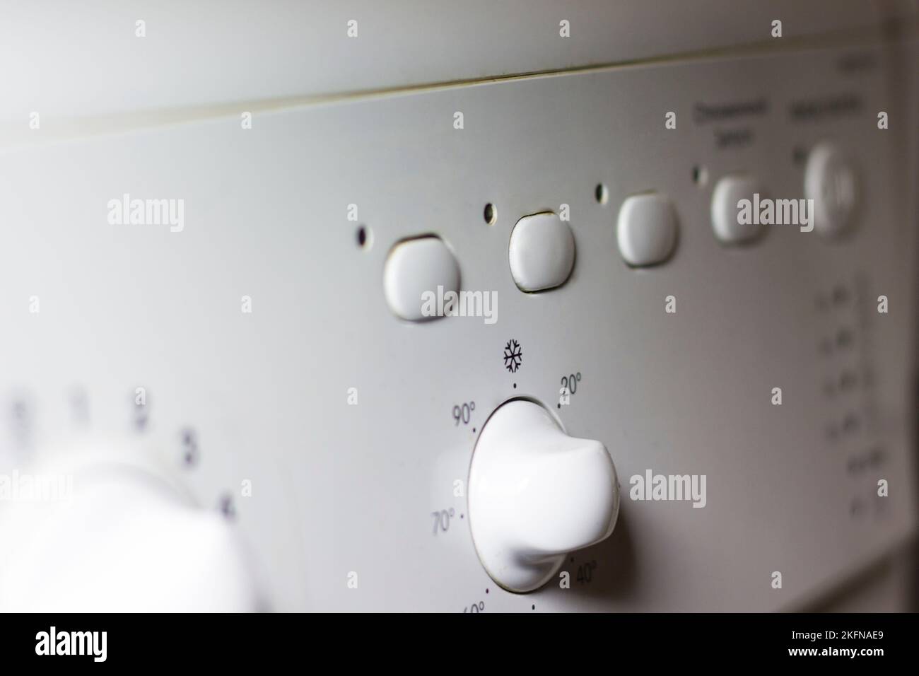 Keypad on a washing machine close-up Stock Photo - Alamy