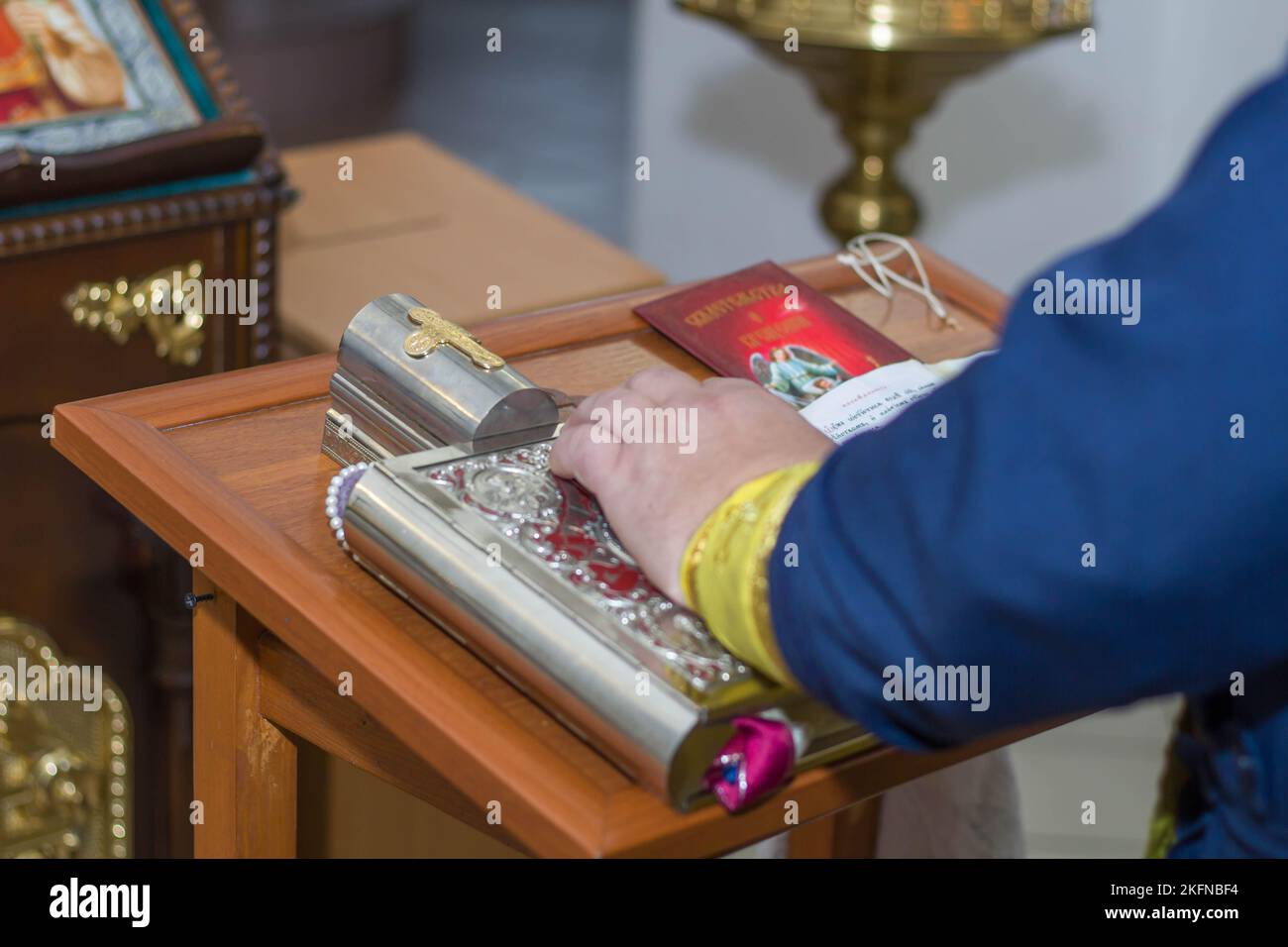 Catholic priest holding holy bible hi-res stock photography and images ...