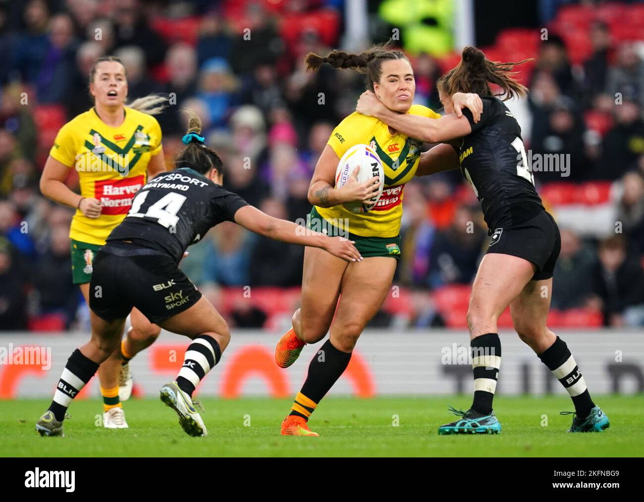 Australia's Isabelle Kelly tackled by New Zealand's Georgia Hale and ...