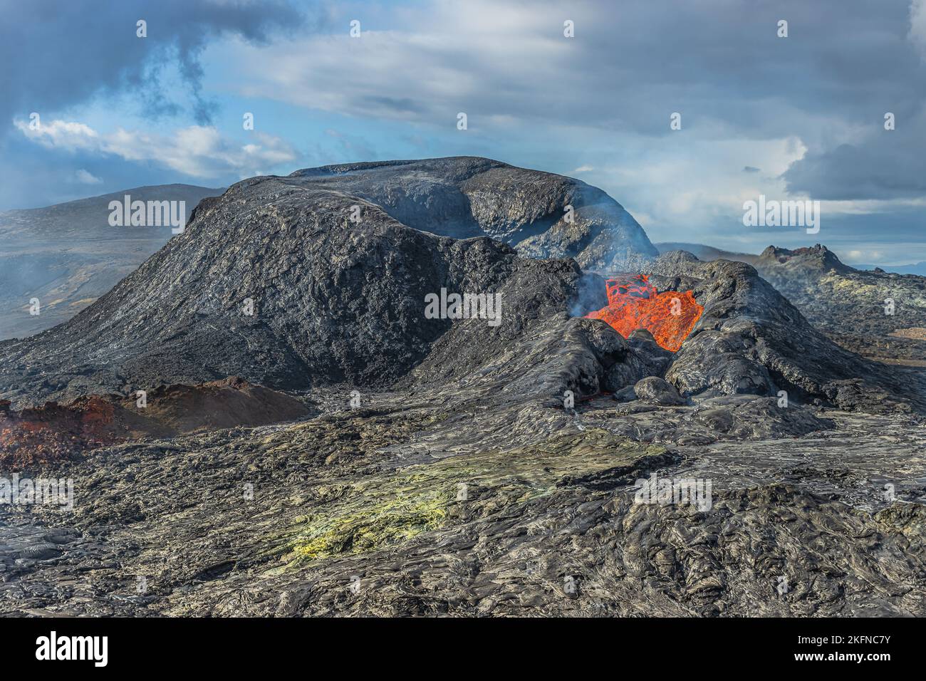 View of active volcano. Volcanic landscape in the day with sunshine ...