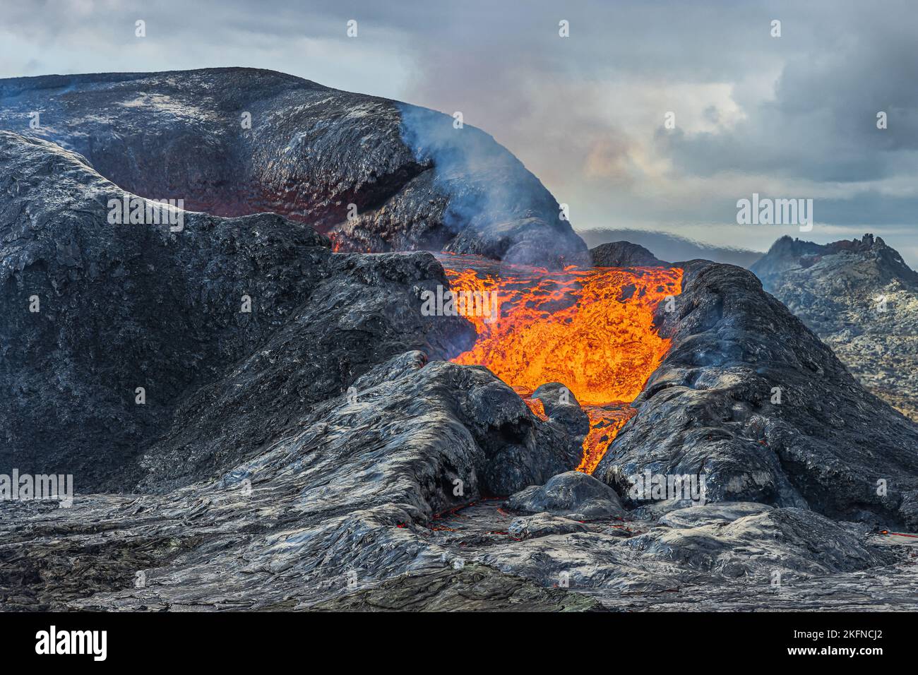 stronger volcanic activity indicated by lava flow. active volcano in ...