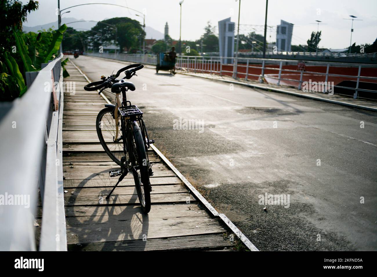 rear view of bicycle on the side of bridge Stock Photo - Alamy