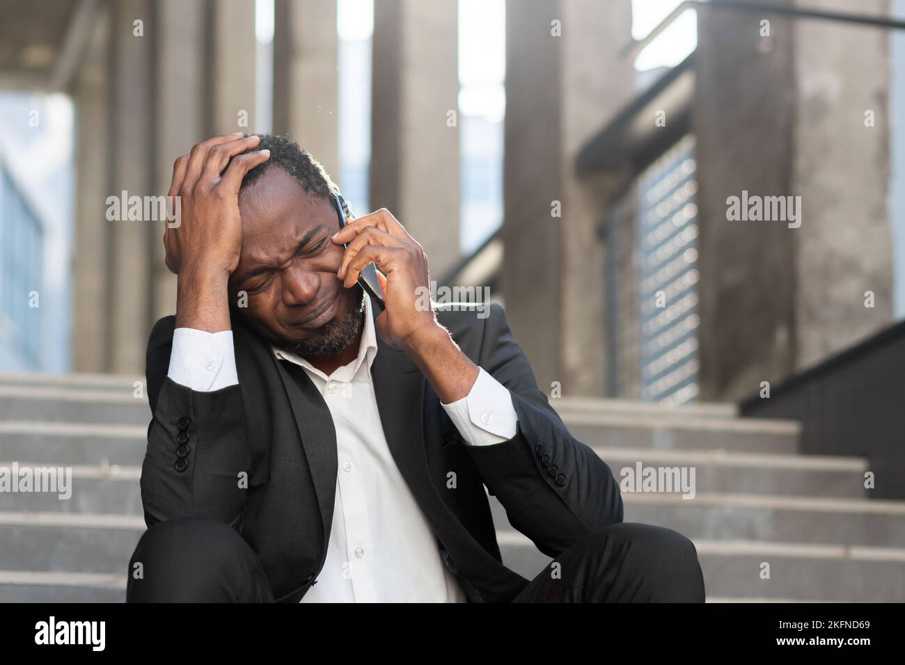 Sad man suit hi-res stock photography and images - Alamy